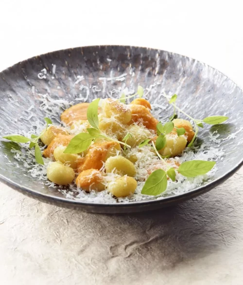 Gnocci van pompoen, parmezaan en lemon cress